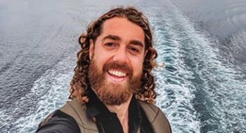 Meet Tour Leader Luke Behind the Mic